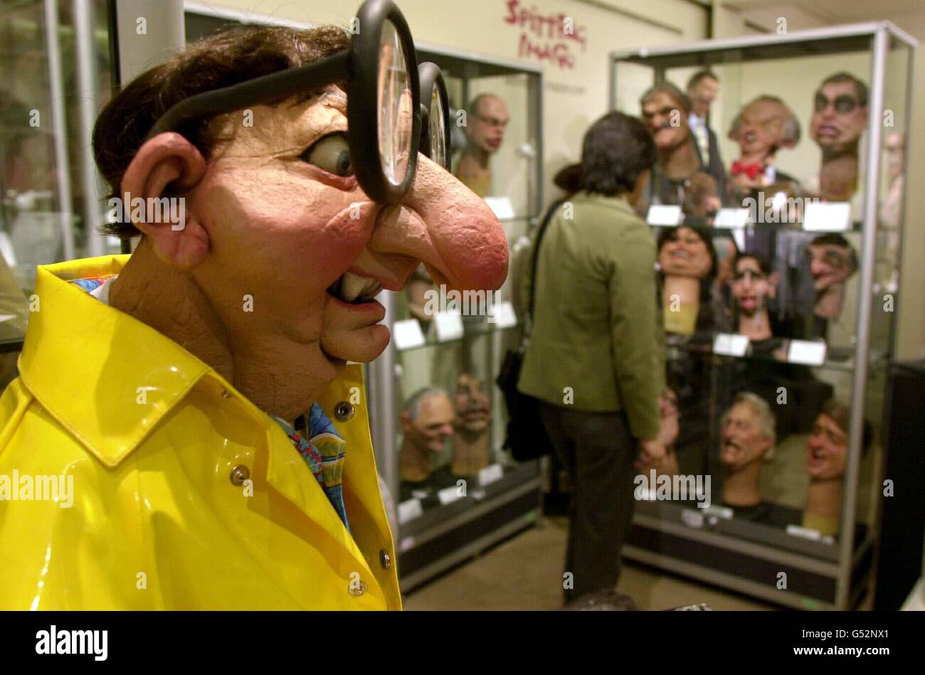 A puppet of TV weatherman Ian McCaskell looks on as Spitting Image ...