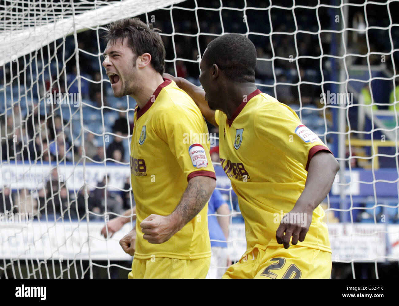 Burnley's Charlie Austin (left) celebrates scoring his third goal with ...