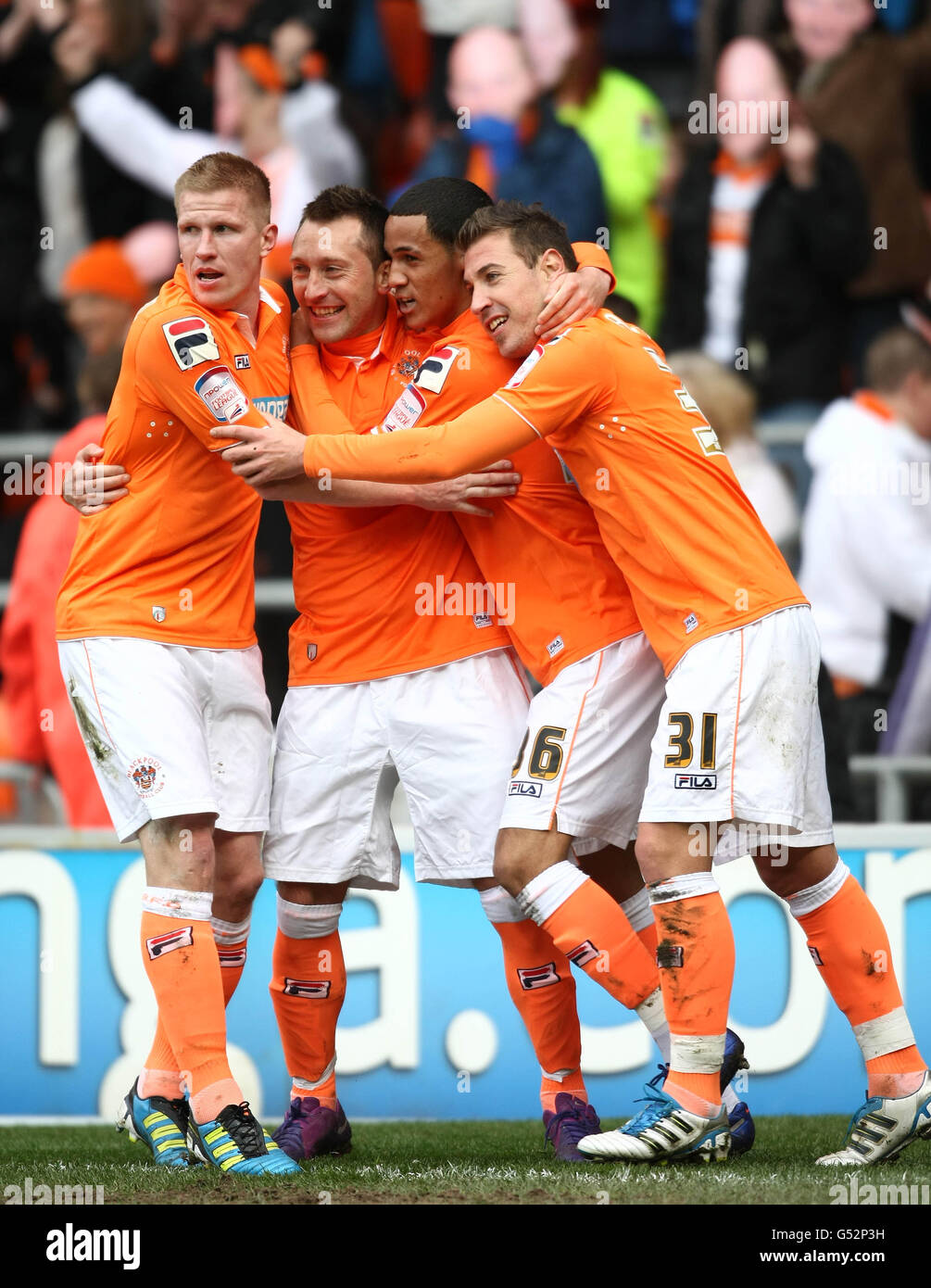 Blackpool's Stephen Dobbie (second left) celebrates scoring his sides ...