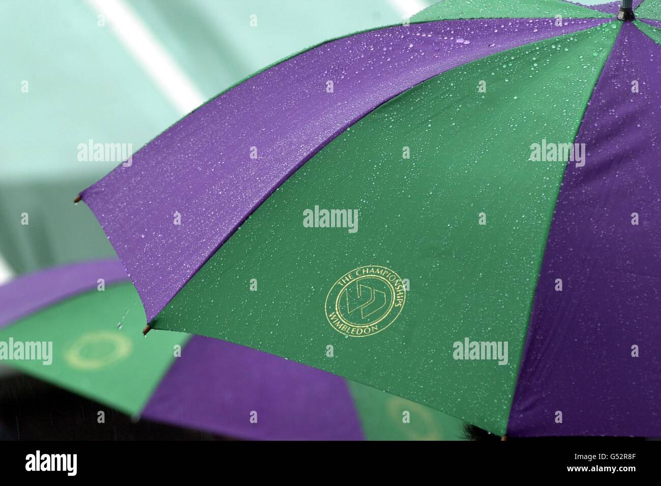 Mens with umbrellas hi-res stock photography and images - Alamy