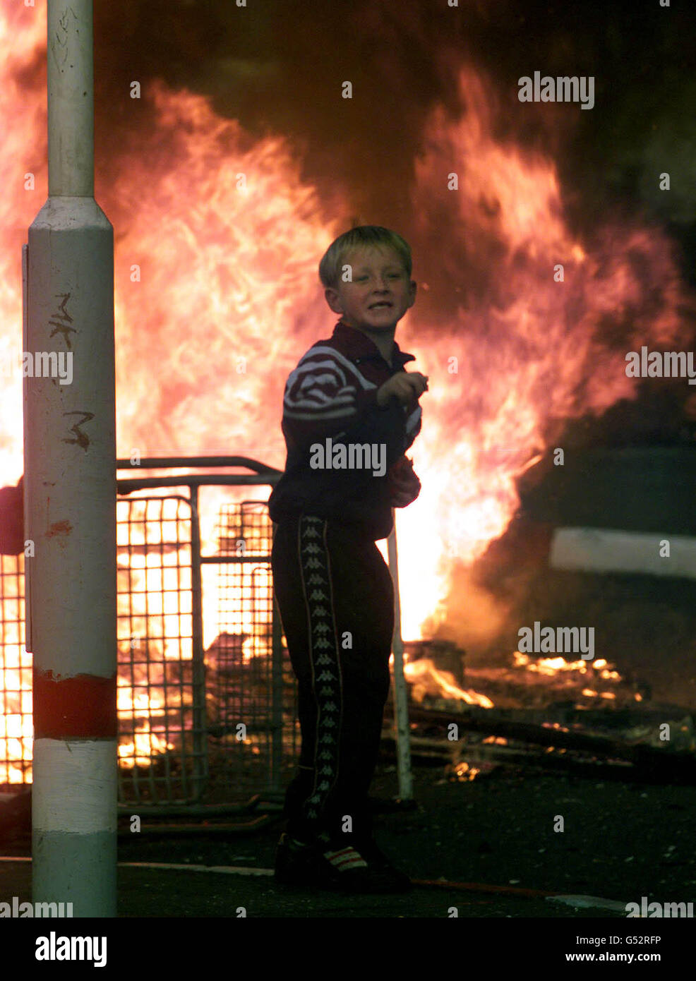 Watches the lighting of a traditional bonfire by ulster loyalists hi ...