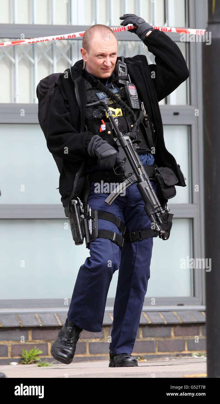 Police at the scene where five fire engines, a fire rescue unit and ...