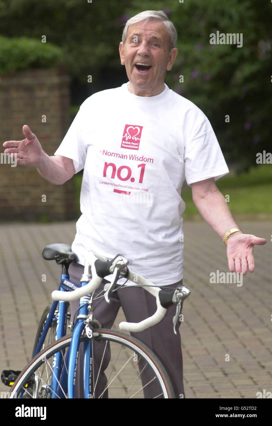 Comedian Norman Wisdom, gets on his bike to support the first British ...