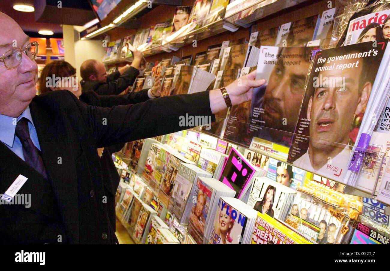 Staff from a branch of wh smith in the strand hi-res stock photography ...