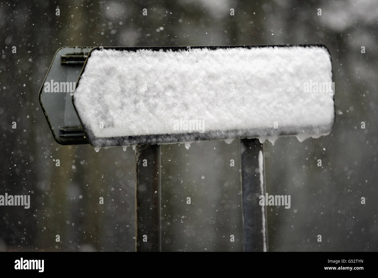 A road sign covered in snow in the Brecon Beacons, south Wales, as tens ...