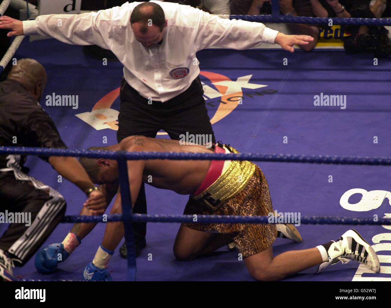Heavyweight boxer American Monte Barrett is counted out during his ...
