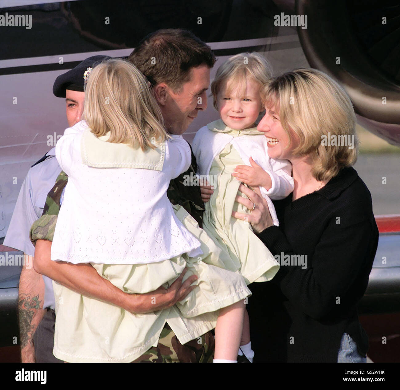 Major Andrew Harrison of the Parachute Regiment, is reunited with his ...