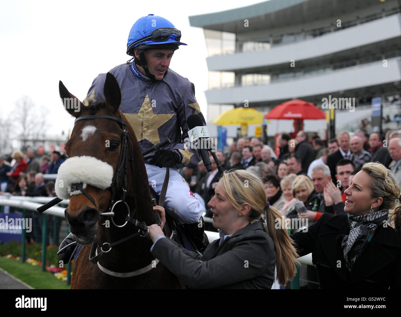 Jockey Tony Hamilton is interviewed by Emma Spencer after winning the ...
