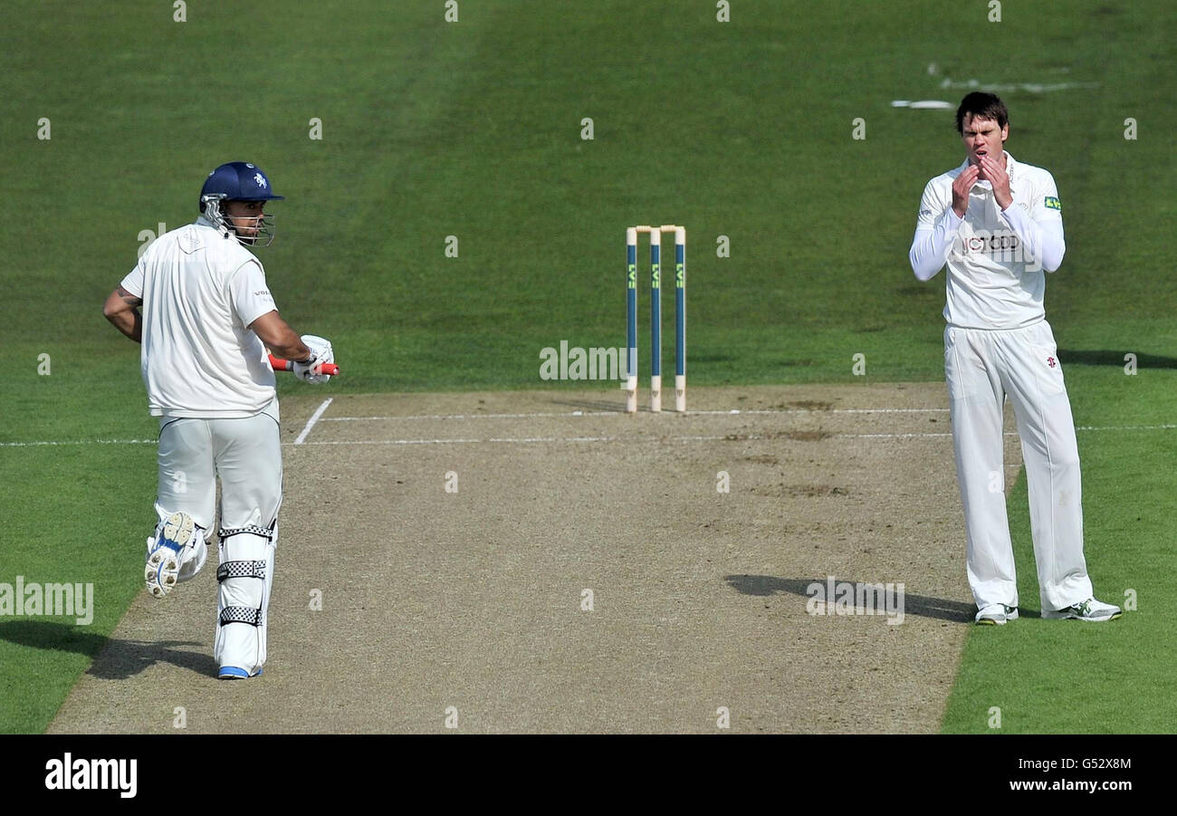 Kent's Scott Newman (left) after hitting for 4 from the bowling of ...