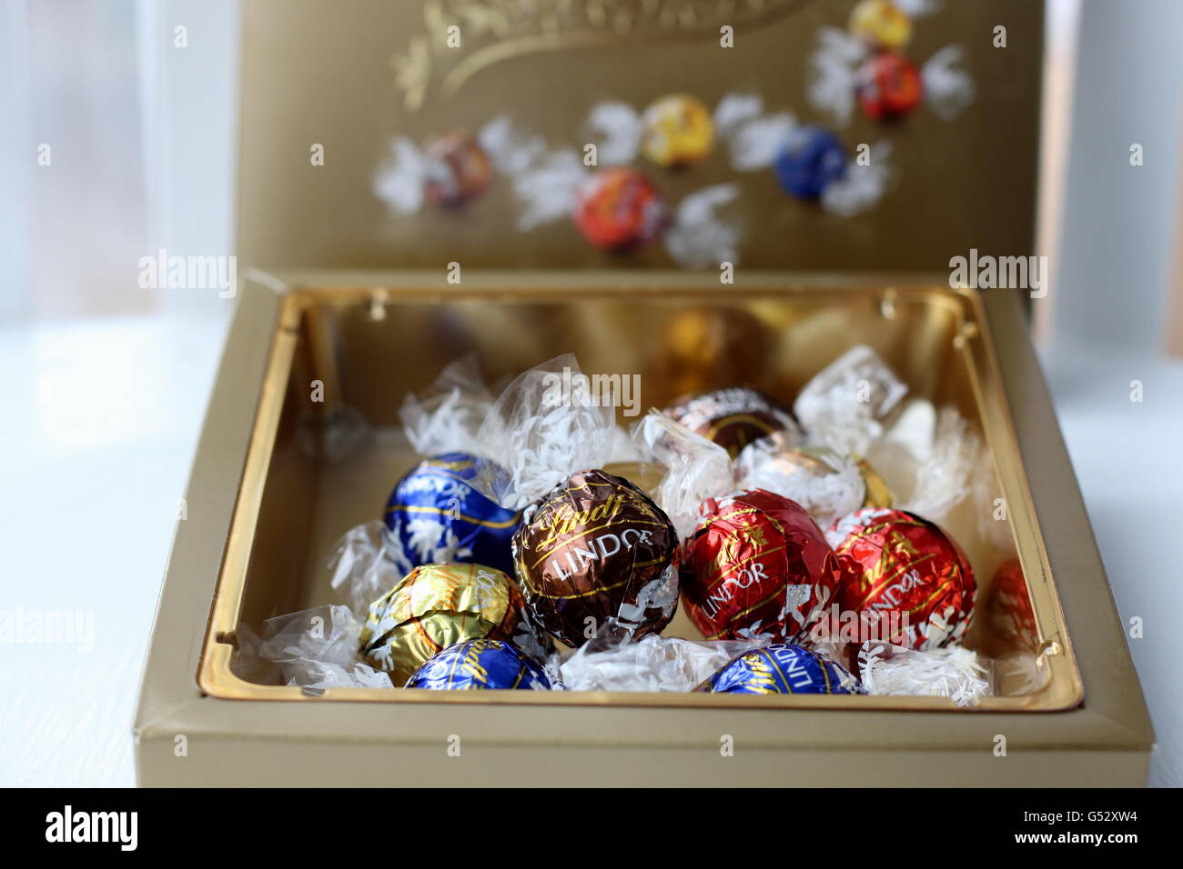 Close up of Assorted Lindt Lindor Chocolates in gold colour box Stock ...