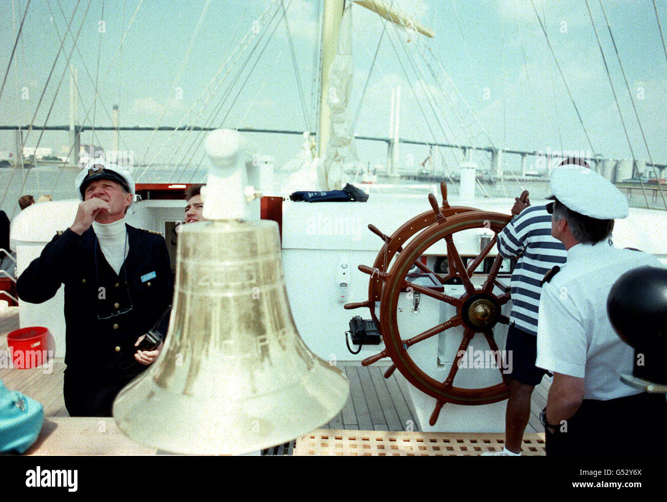 The pilot and helmsman of the Royal Clipper look ahead down the Thames ...