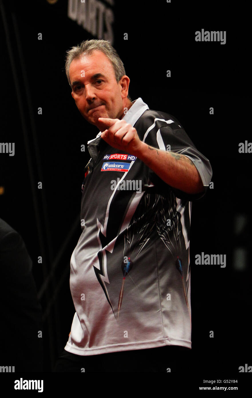 Phil taylor celebrates point during his victory over andy hamilton hi ...