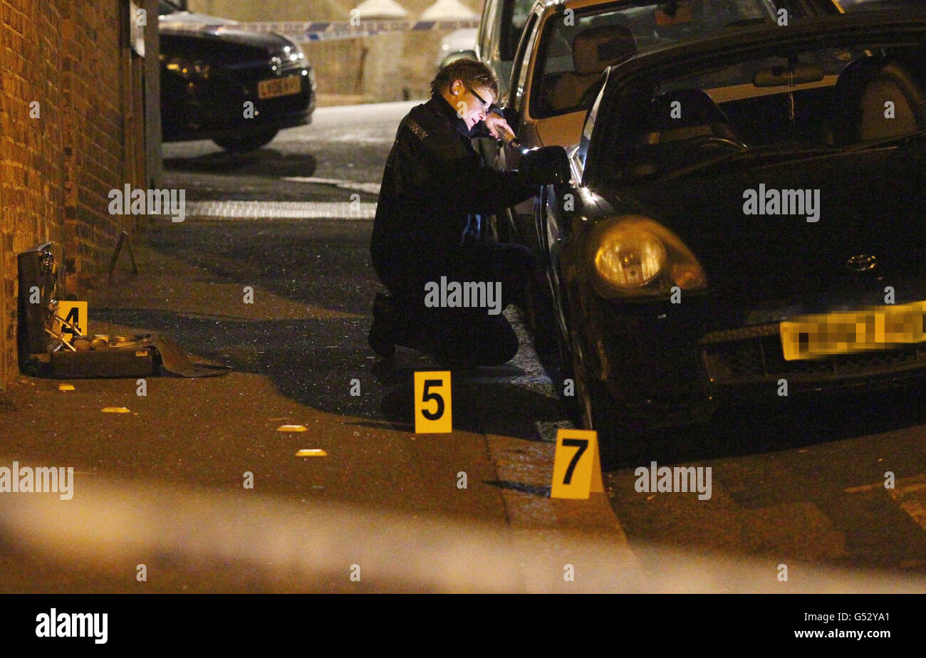 A police scenes of crime officer investigates the scene in Hastings ...