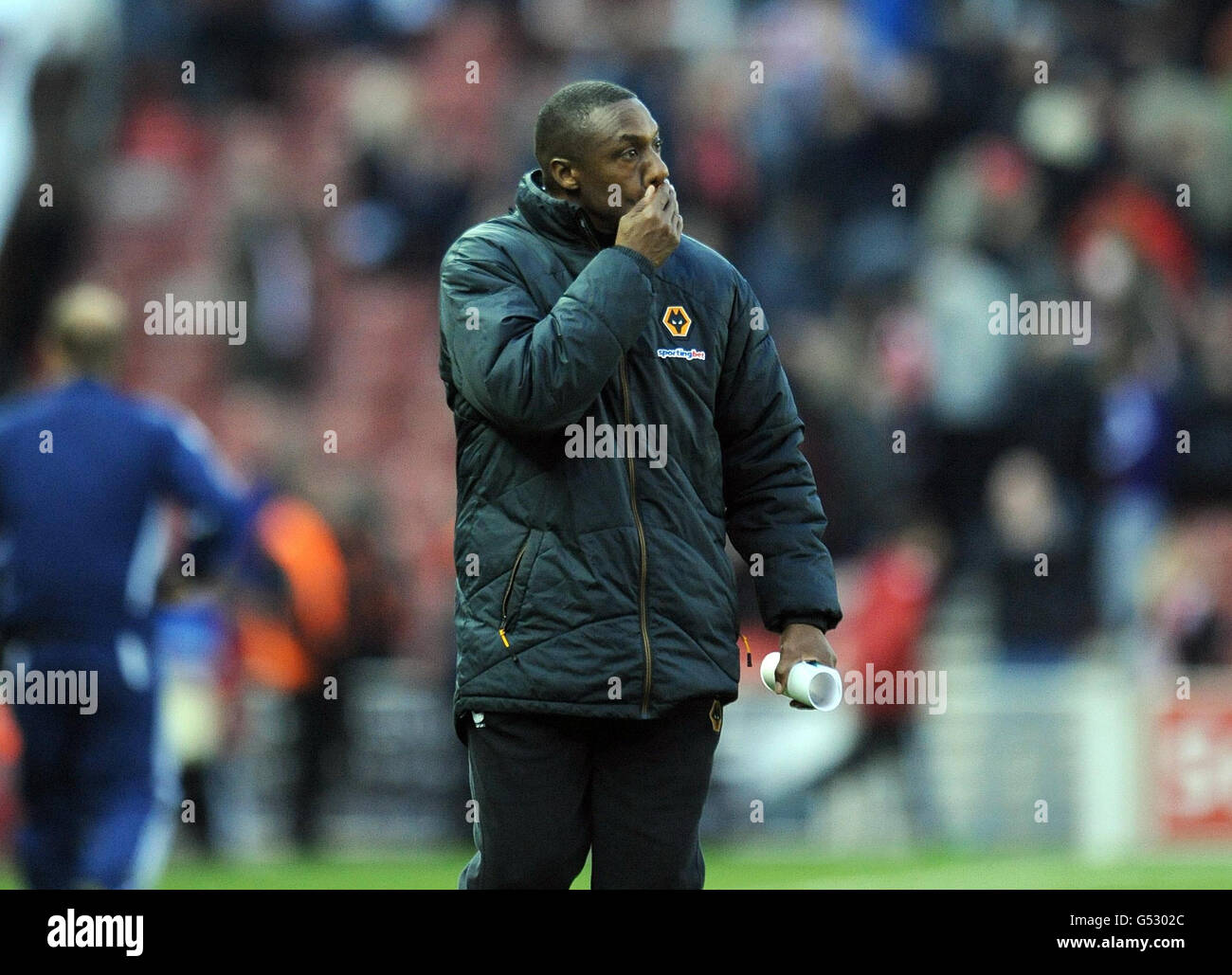 Wolverhampton manager Terry Connor looks dejected on the pitch after ...