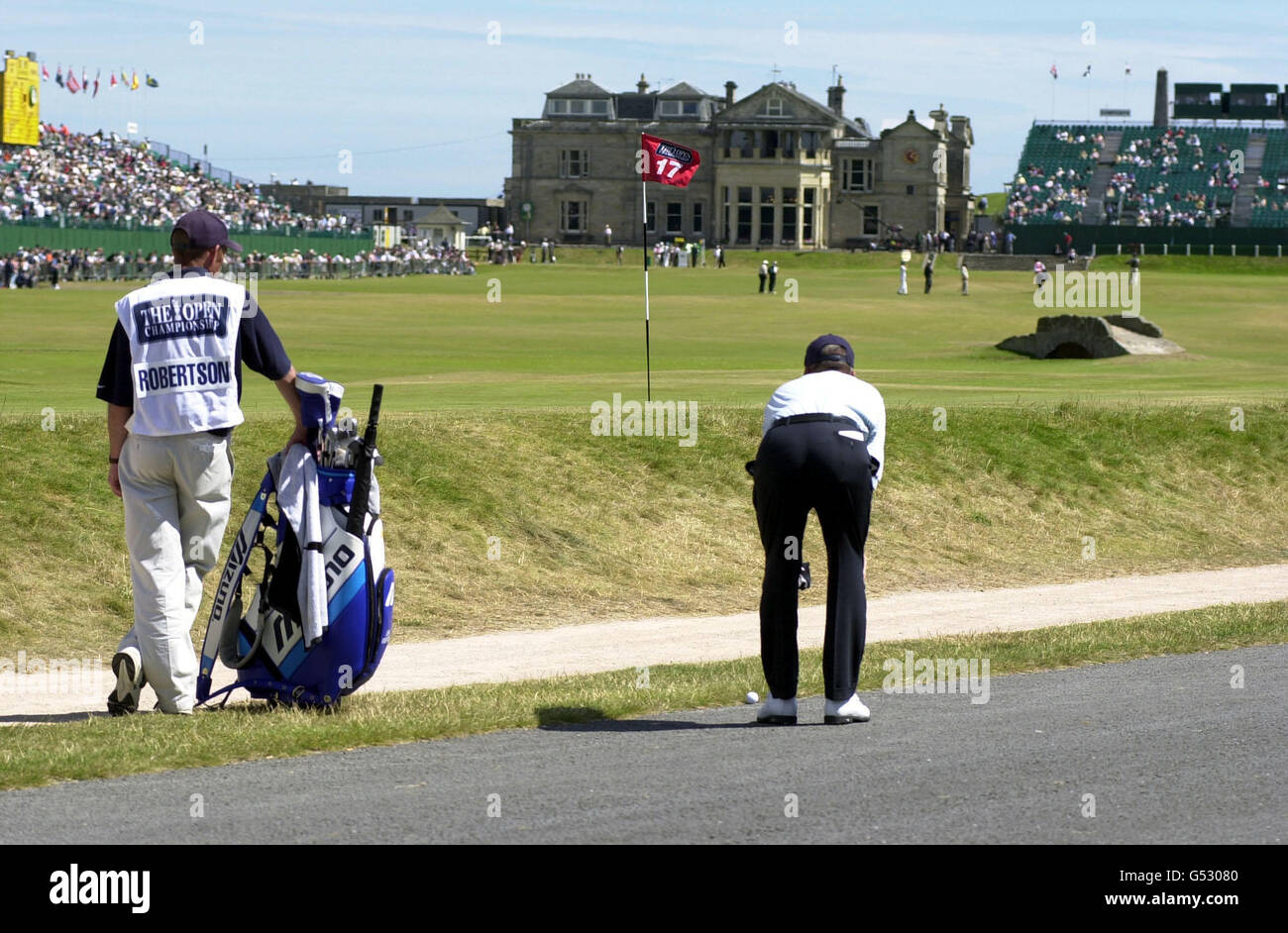 Britain's Dean Robertson with his caddie, deciding how to play a shot ...