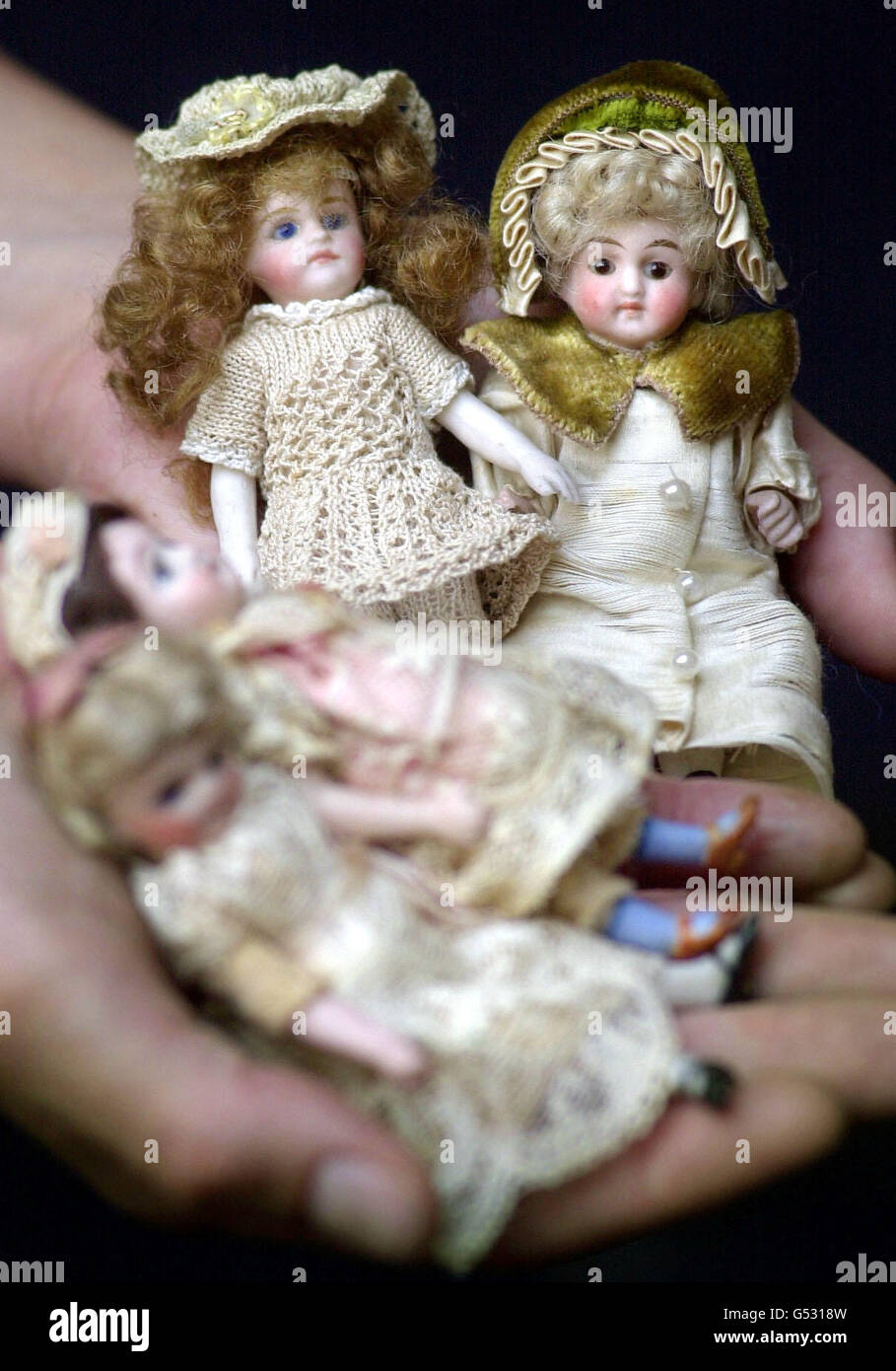Miniature dolls auction Stock Photo - Alamy