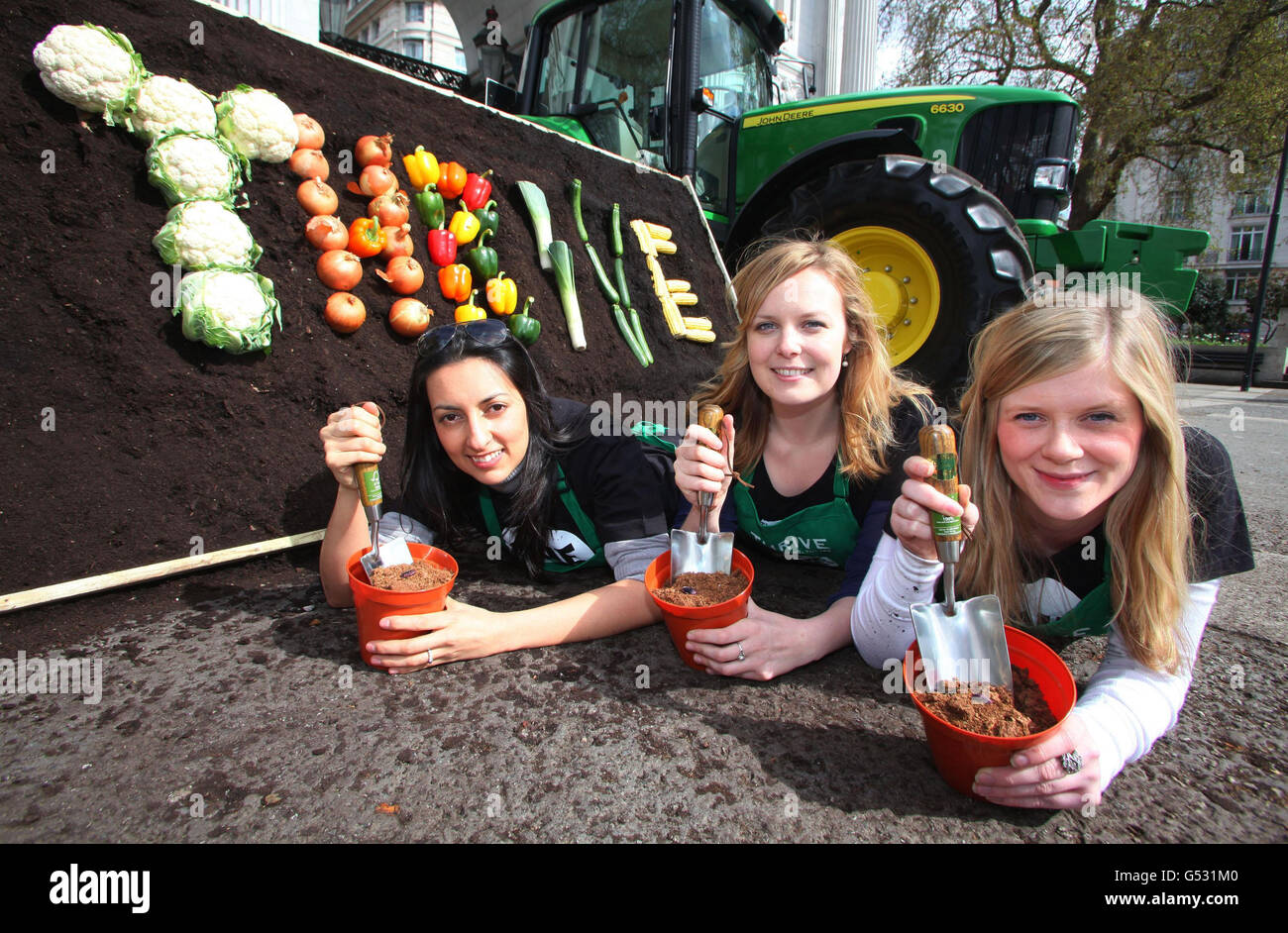 Seed sowing event at Marble Arch Stock Photo - Alamy
