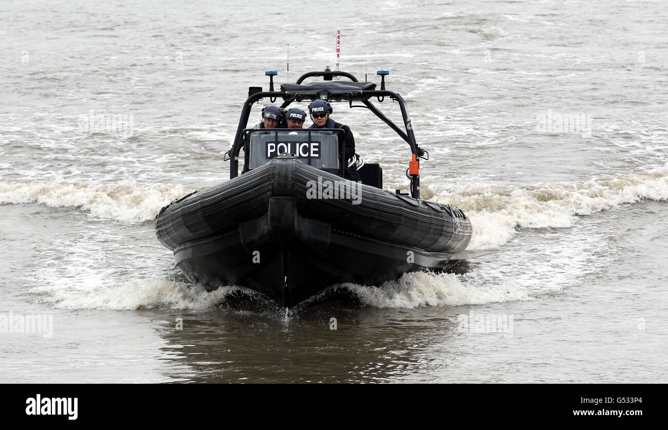 A police boat on the Thames at Chiswick Bridge Stock Photo - Alamy