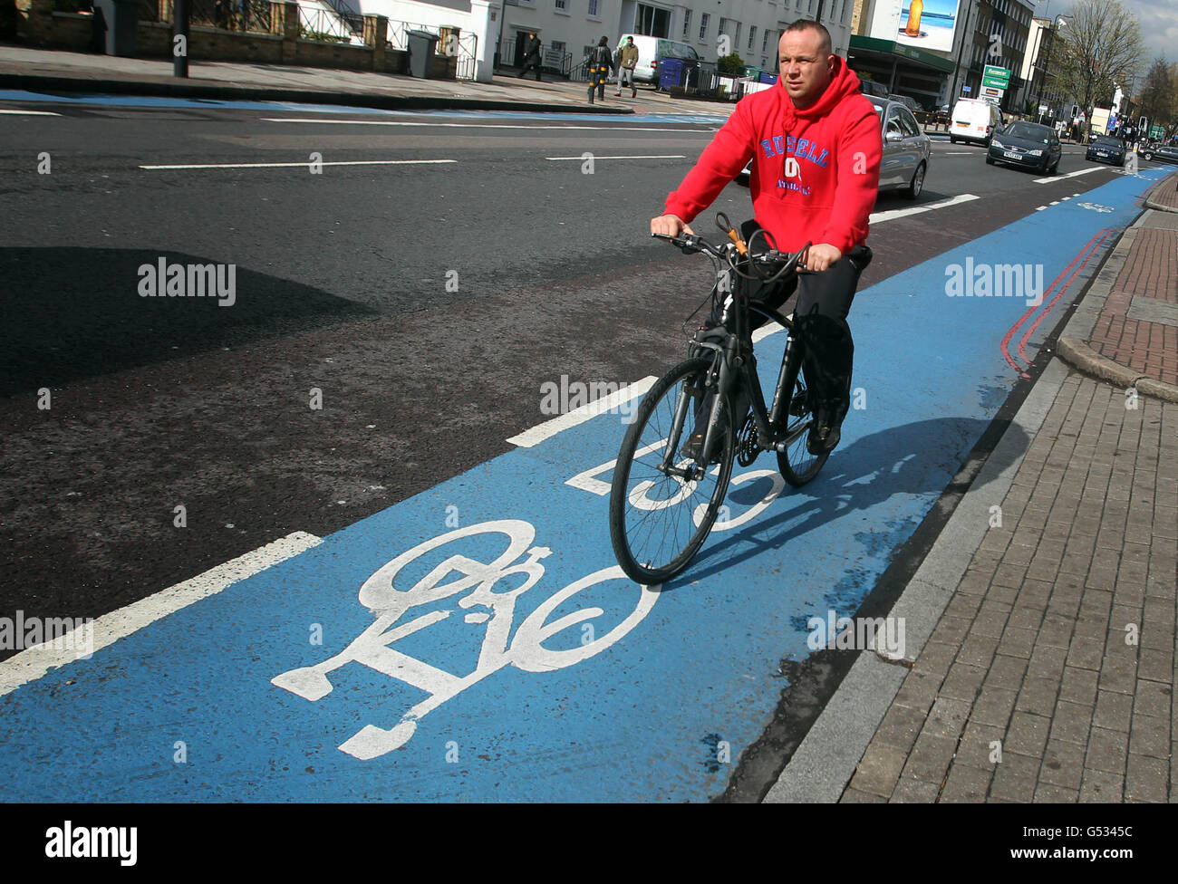 A cyclist on the CS7 Barclays Cycle Superhighway in London Stock Photo ...