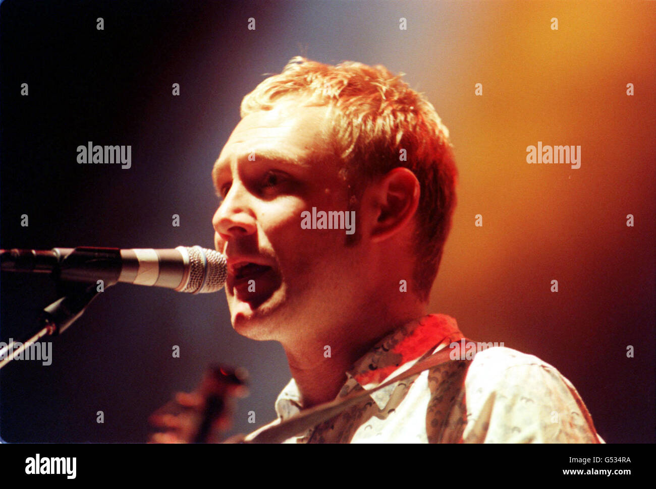 Singing music celebrity microphone sideburns hi-res stock photography ...
