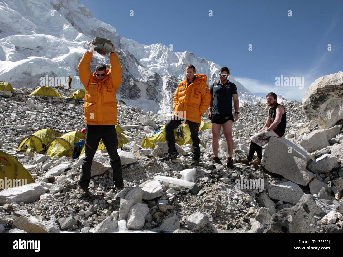 Captain David Wiseman, from the Walking With The Wounded team, breaks ...