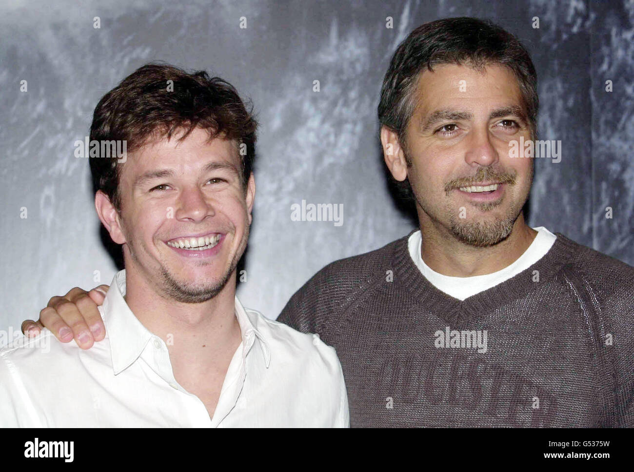 American actors George Clooney (R) and Mark Wahlberg attending the UK ...