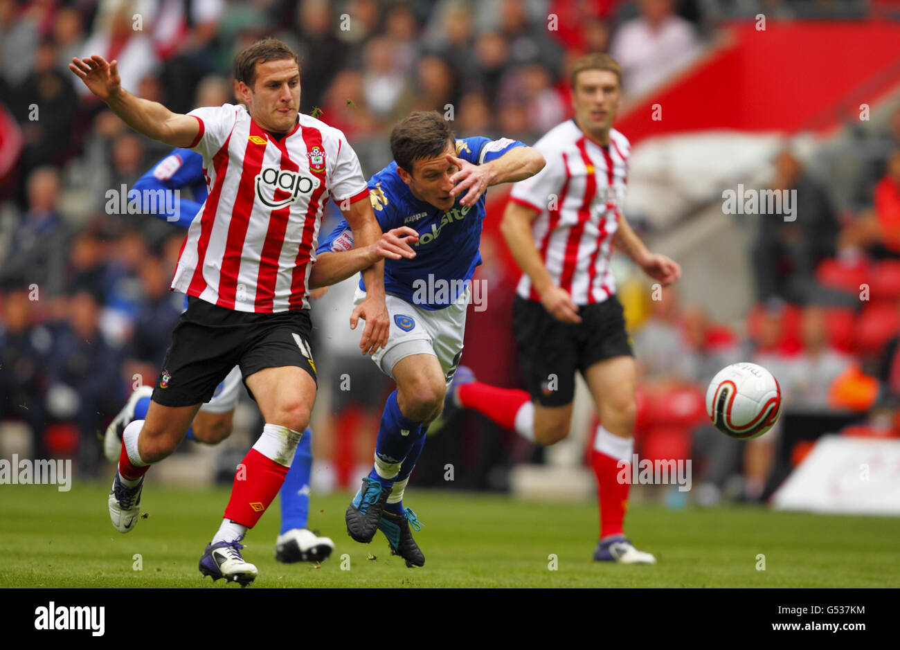 Southampton's Billy Sharp (left) in action against Portsmouth's Jason ...