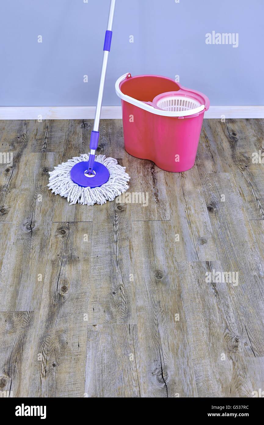 Photo of a broom and mop hi-res stock photography and images - Alamy