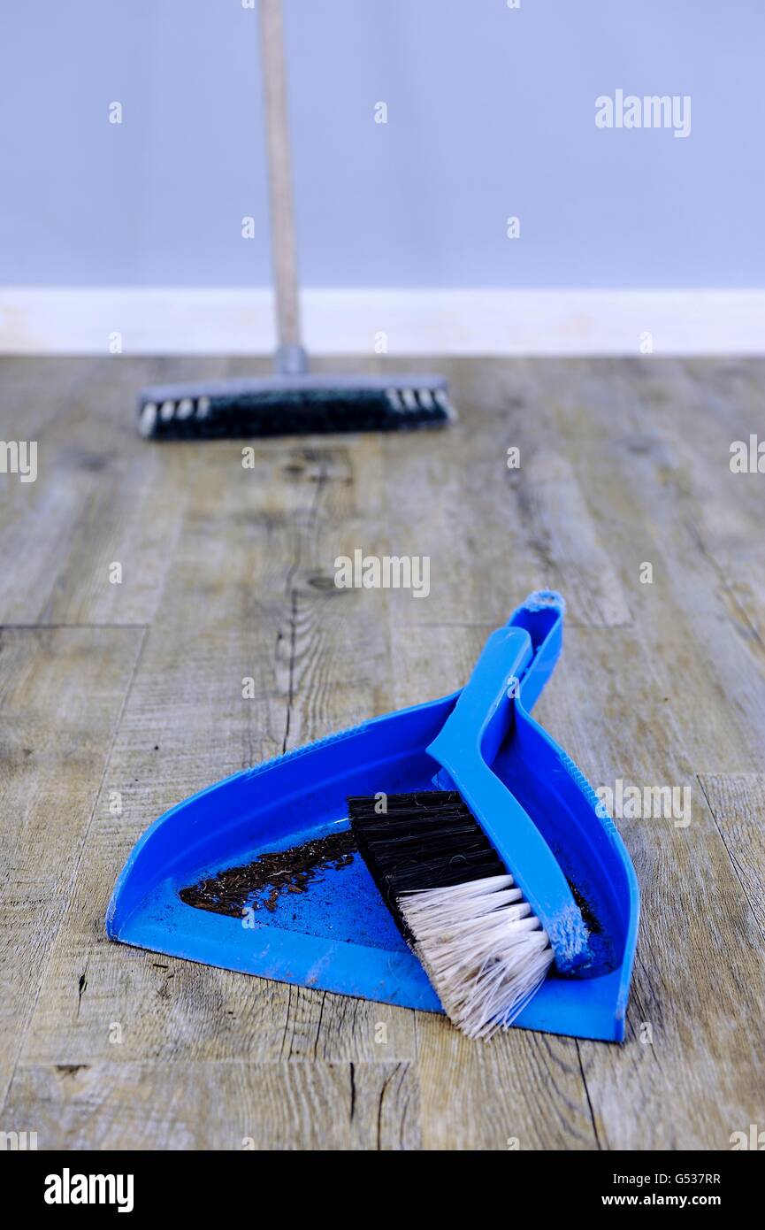 A studio photo of a broom cleaning up Stock Photo - Alamy