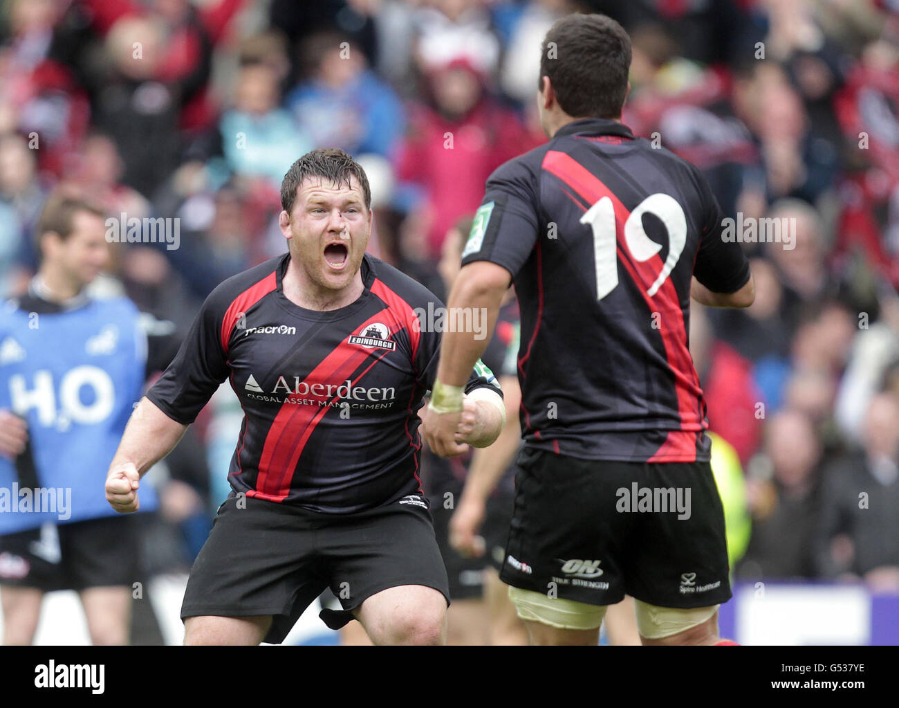 Edinburgh's Allan Jacobsen (left) celebrates their victory over ...