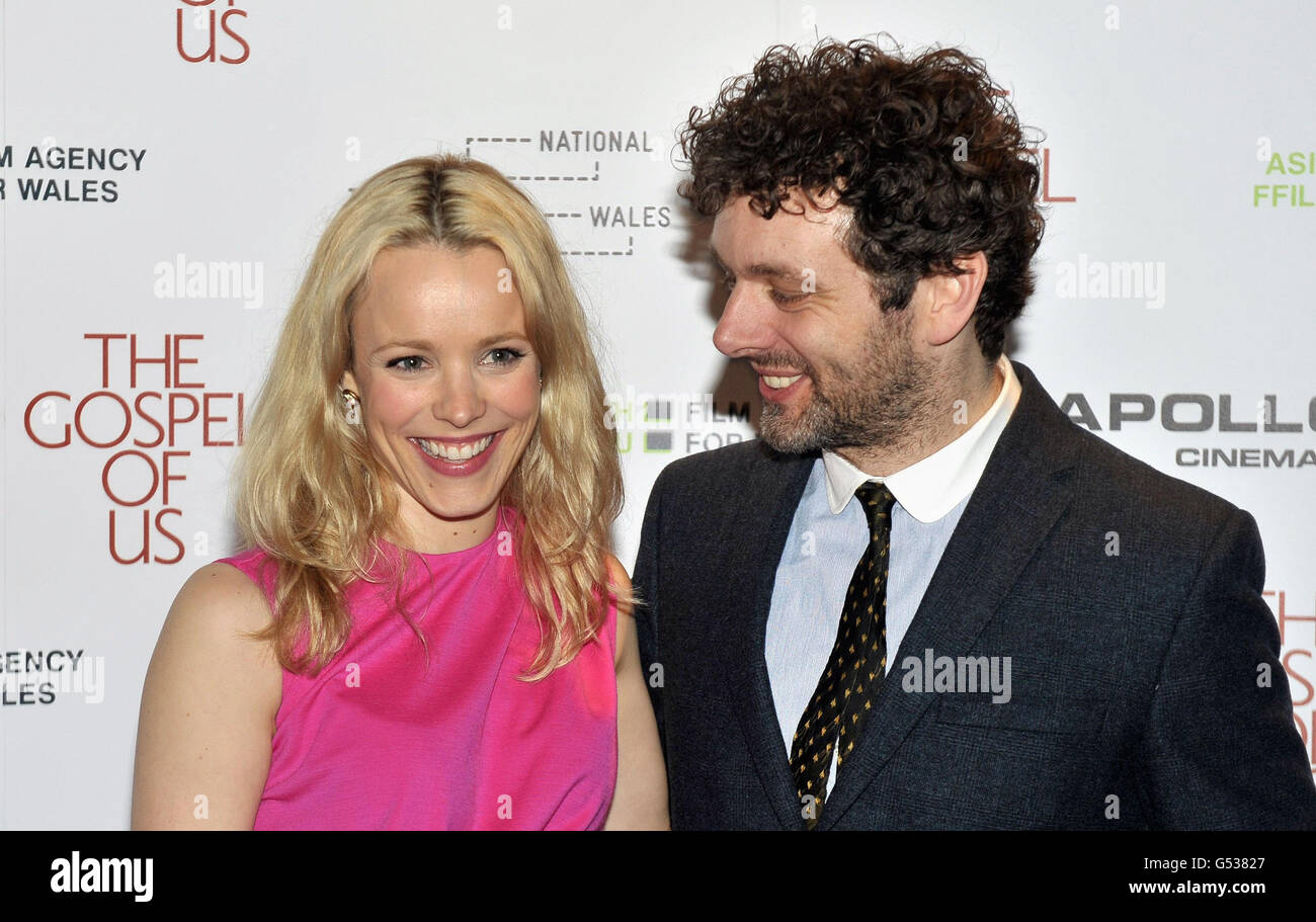 Michael Sheen (right) arrives with his partner Rachel McAdams for the ...