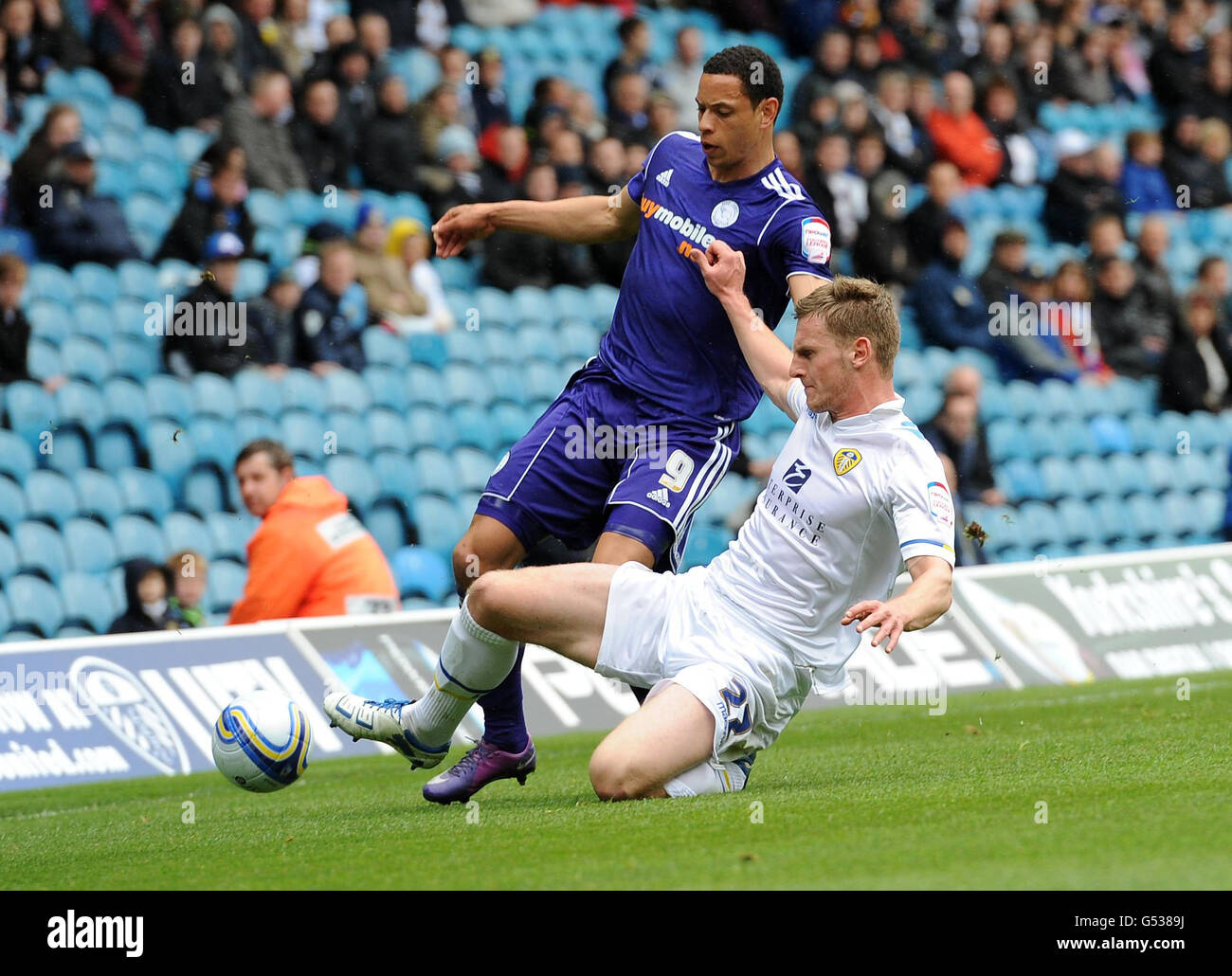 Derby County's Nathan Tyson (left) and Leeds United's Tom Lees battle ...