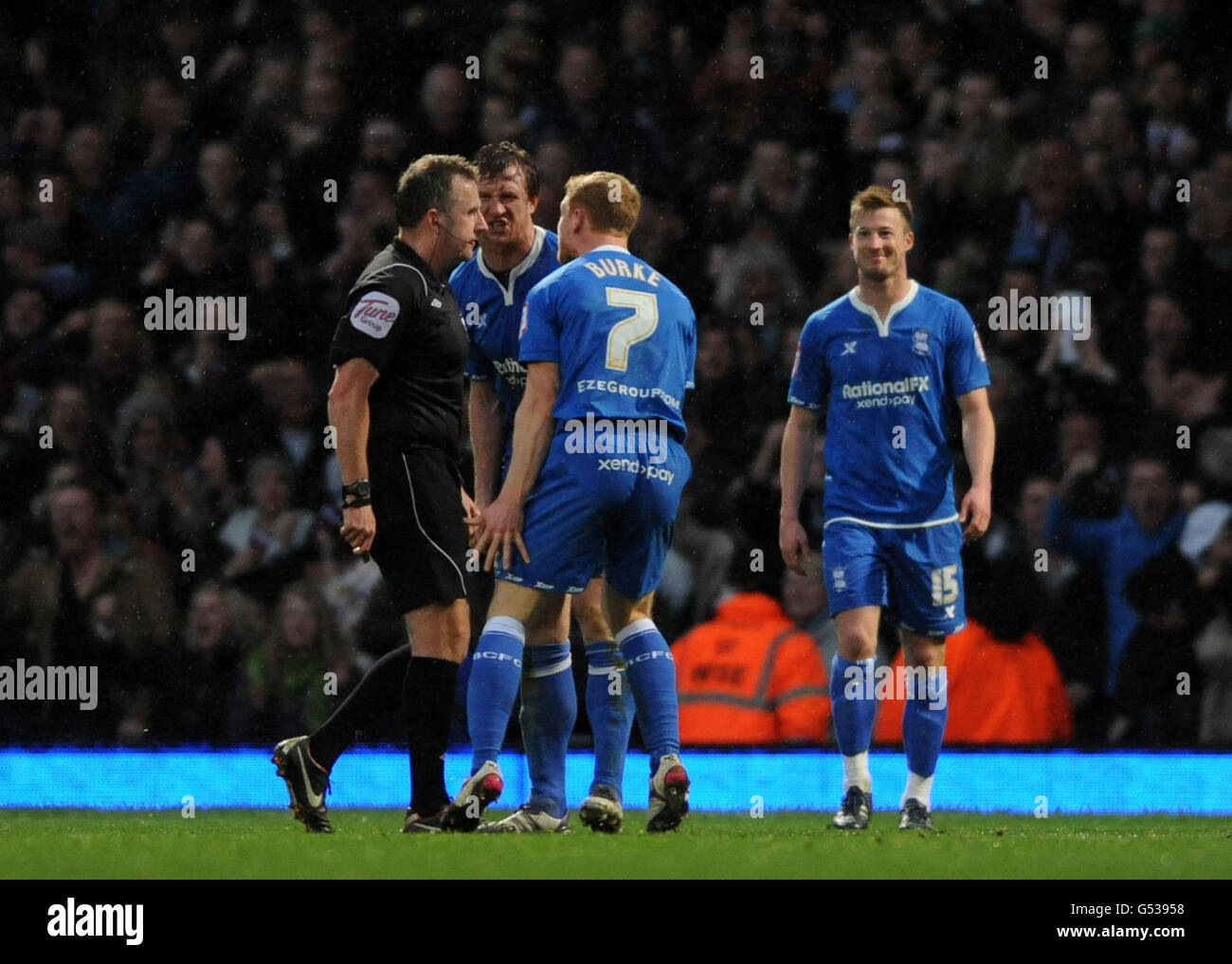 Birmingham's players surround the referee after he awards a penalty to West Ham during the ...