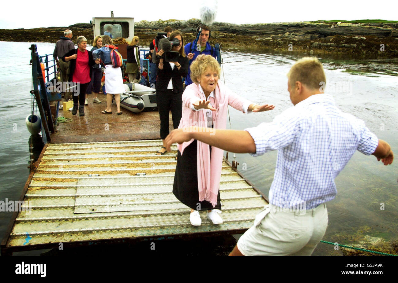 BBC Castaway contestant Ben Fogle (R) runs to greet his mother Julia ...