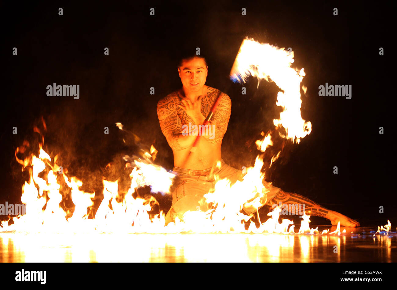 Mica Naruo performs " Fire knife Dance" during rehearsals at the SECC ...