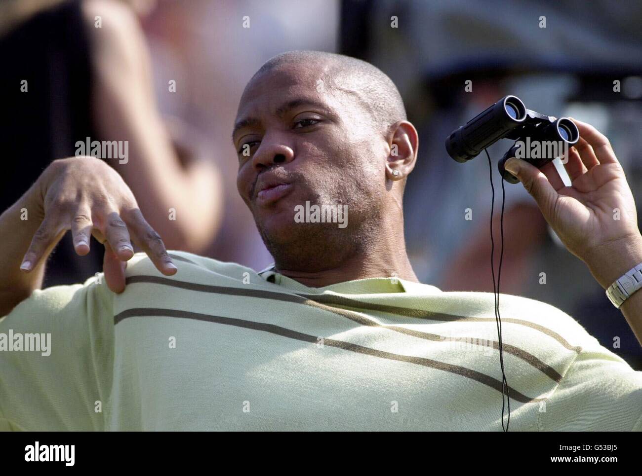 Injured sprinter Maurice Greene from America watches his rivals at the ...