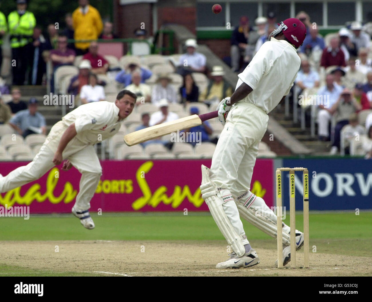 West Indies batsman Curtly Ambrose avoids a bouncer from England bowler ...