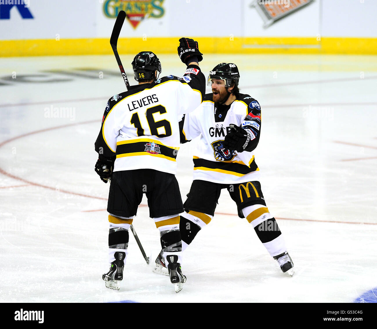 Nottingham Panthers Marc Levers (left) celebrates scoring with team ...