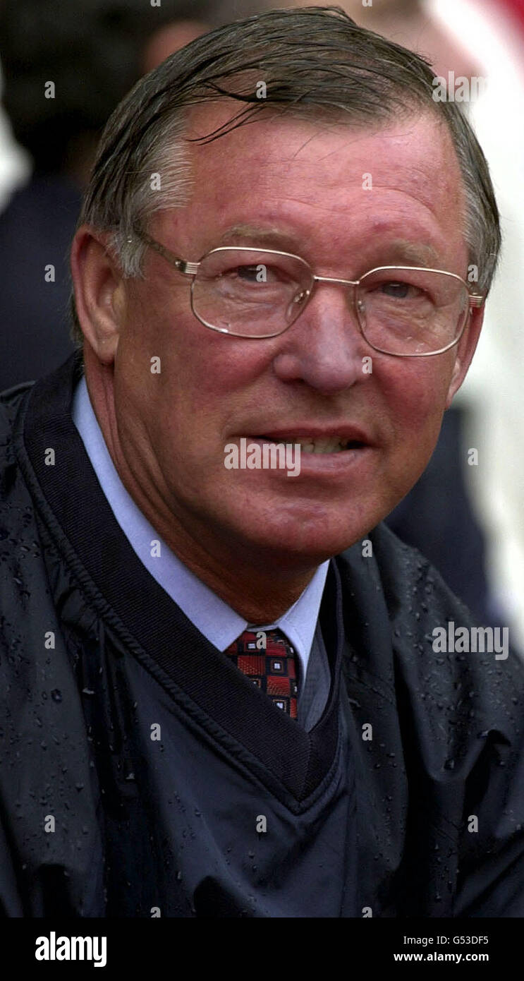 Manchester United manager Sir Alex Ferguson on the bench during their ...