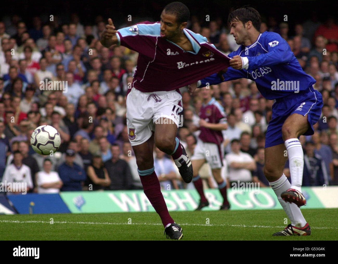 Football pulls shirt pulling hi-res stock photography and images - Alamy