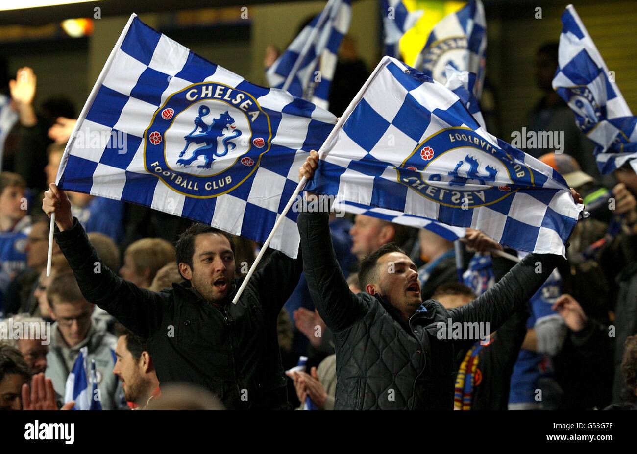 Chelsea fans celebrate in the stands hi-res stock photography and ...