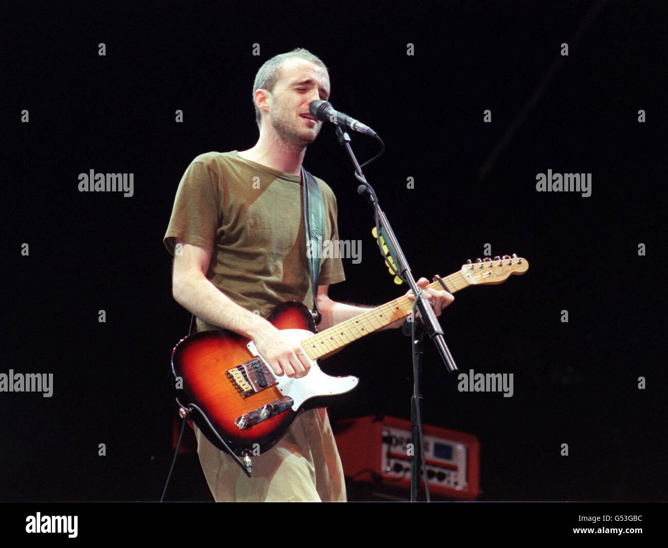 Fran Healy, lead singer of the band Travis performing on stage at the ...