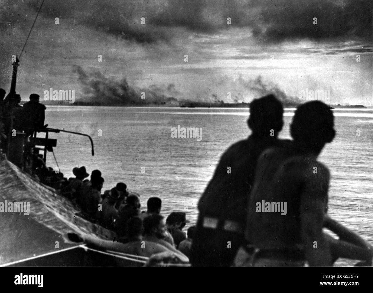 BORNEO LANDINGS 1945: Australian troops watch from their ship as smoke ...