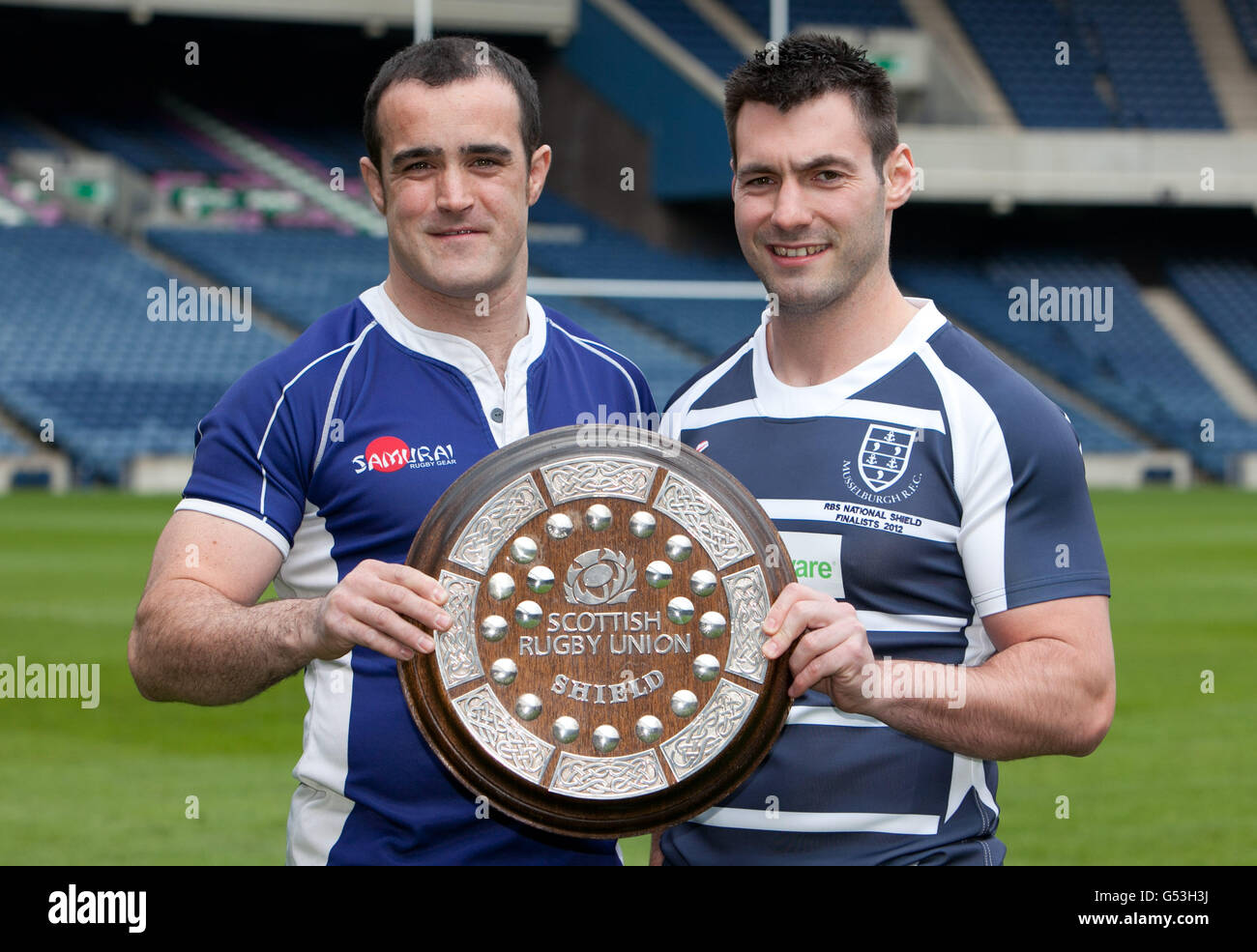 Dunfermline's Scott Swankie and Musselburgh's James Doig hold the RBS ...