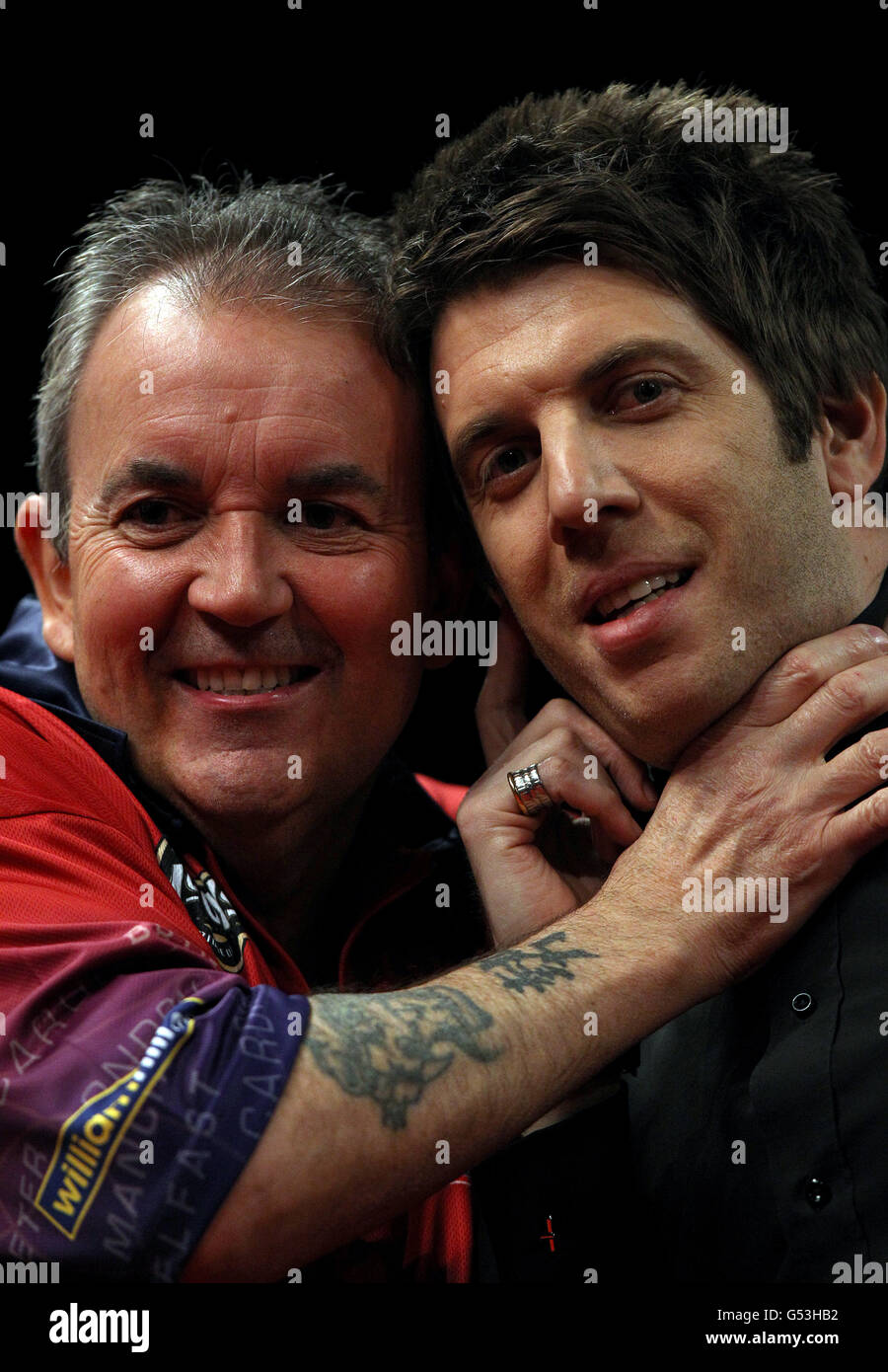 Phil Taylor (left) jokes around with Sky Sports presenter Andy ...