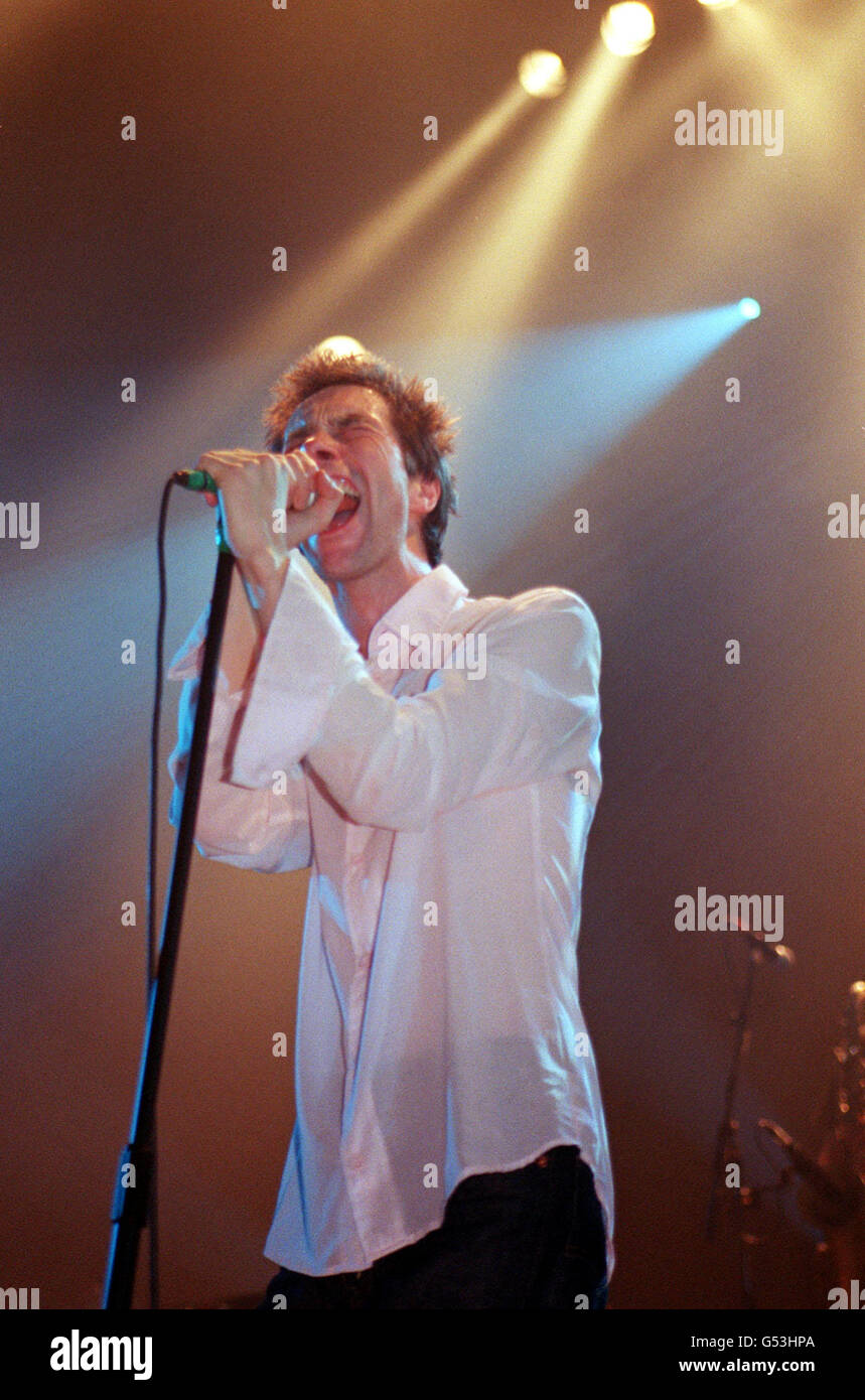 Bobby Gillespie, lead singer of rock group Primal Scream, performing on ...