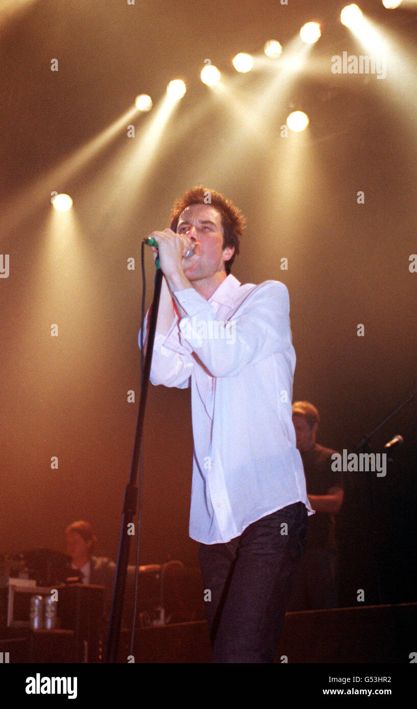 Bobby Gillespie, lead singer of rock group Primal Scream, performing on ...