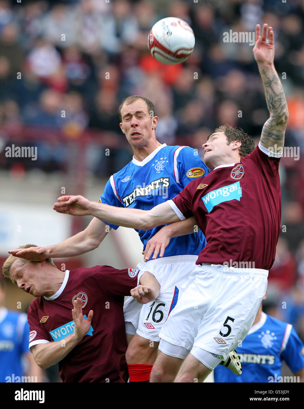 Hearts Darren Barr challenges Rangers Steven Whitaker (left) during the ...