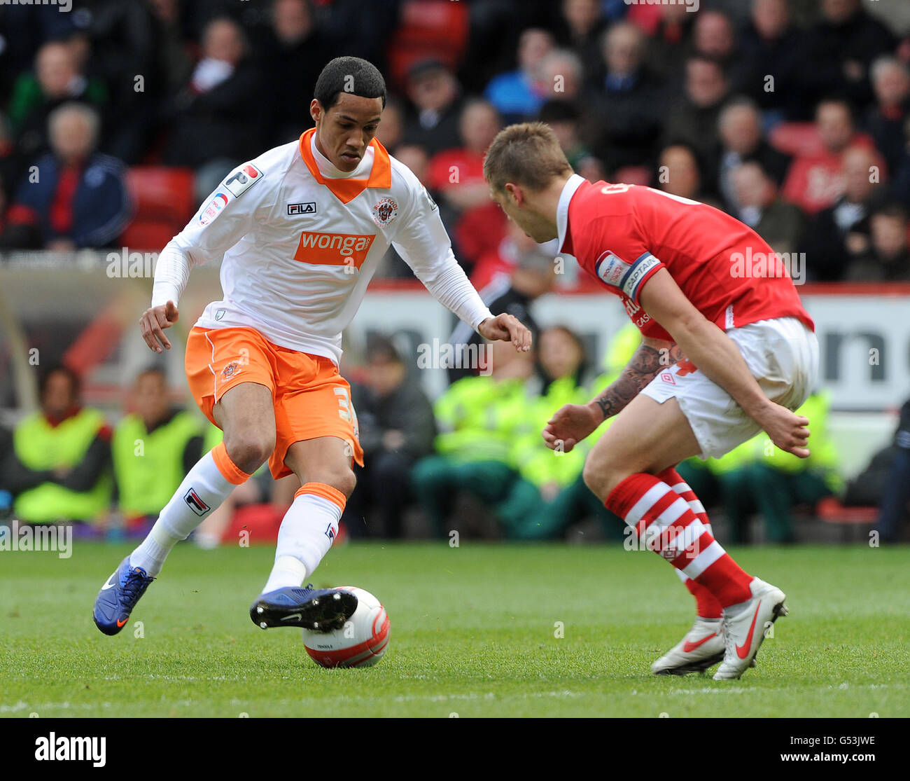 Nottingham forests chris gunter right and blackpools thomas ince left ...