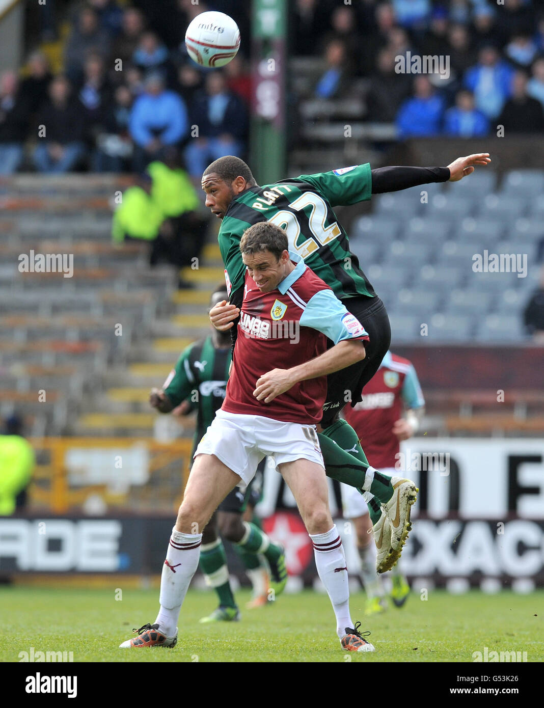 Coventry City's Clive Platt battles for the ball with Burnley's Michael ...